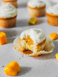 Mango Cupcakes with Filling and Buttercream - Susan Brings Dessert
