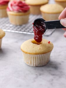Ultimate Raspberry Almond Cupcakes with Filling - Susan Brings Dessert