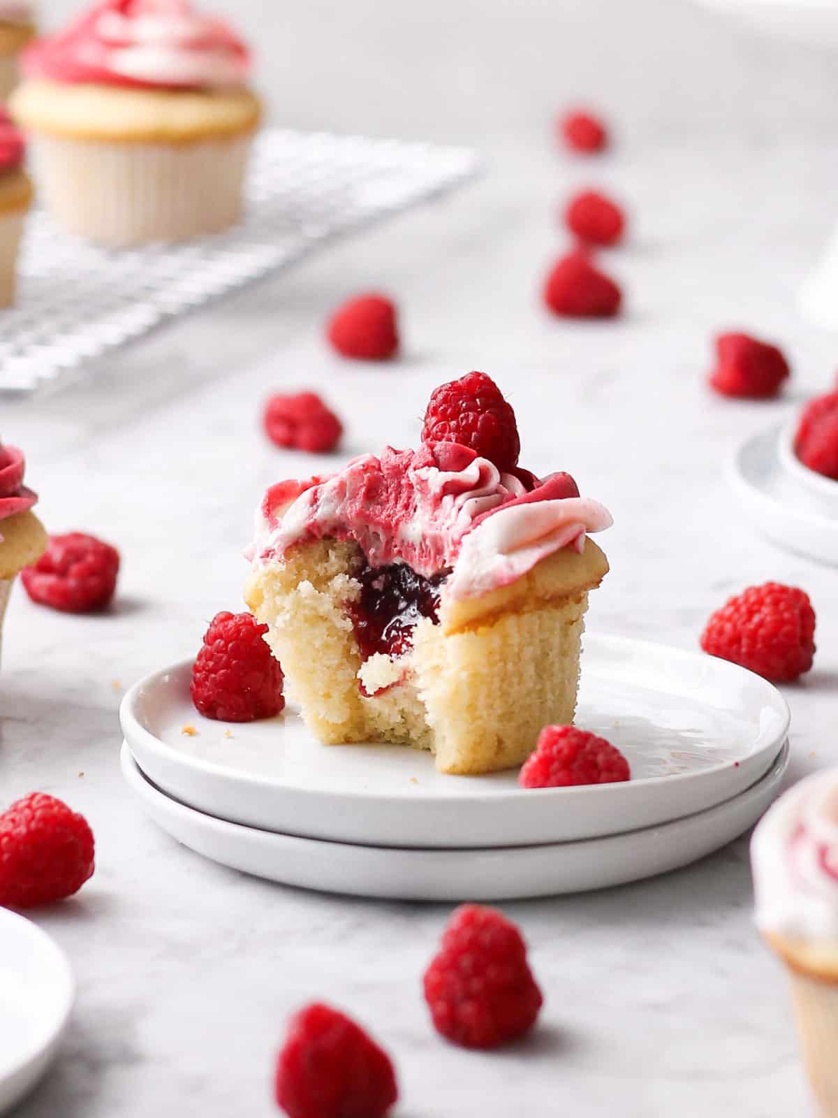 Ultimate Raspberry Almond Cupcakes with Filling - Susan Brings Dessert