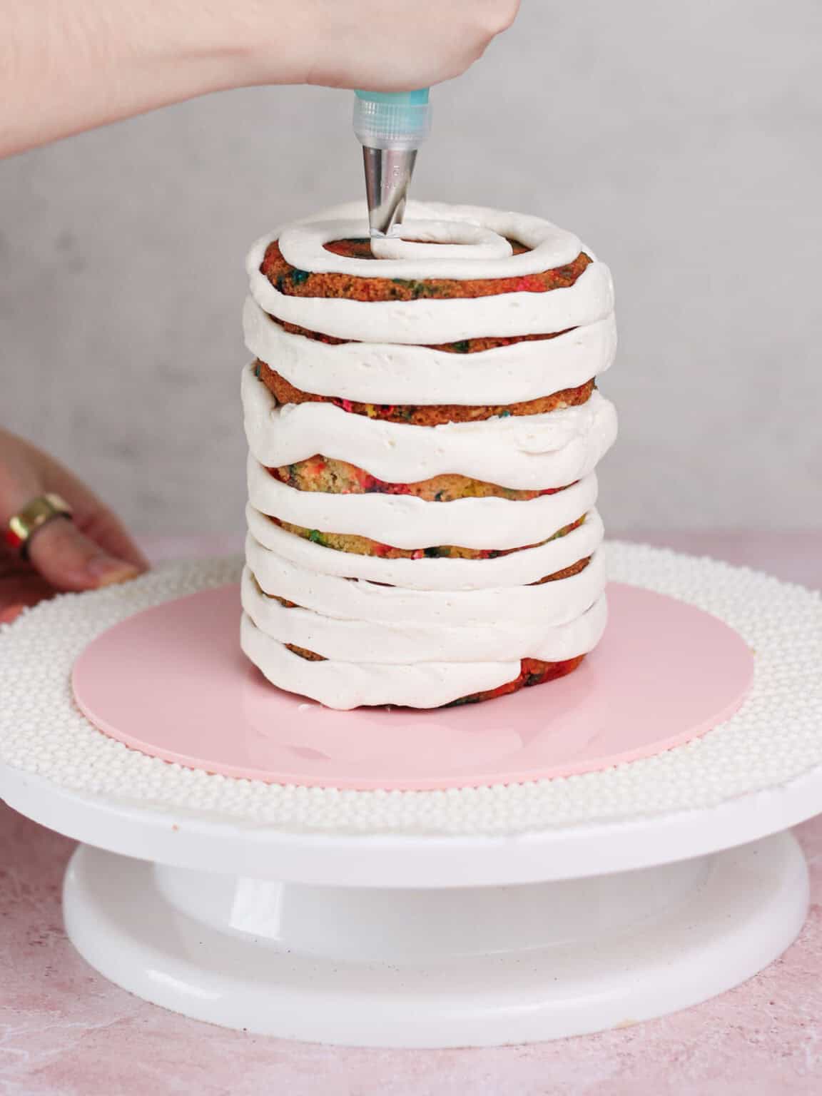 How to Crumb Coat a Layer Cake with Buttercream - Susan Brings Dessert