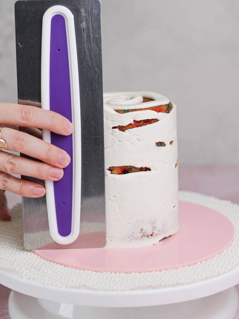 How to Crumb Coat a Layer Cake with Buttercream - Susan Brings Dessert