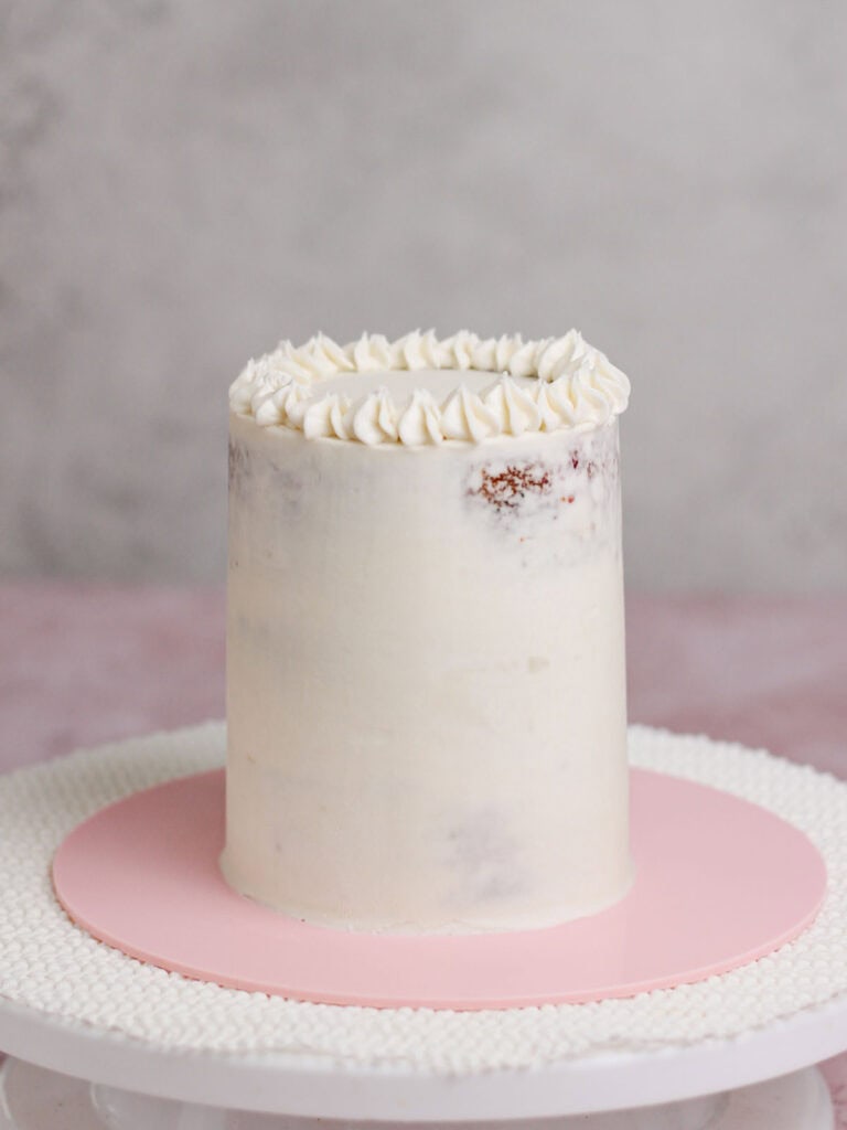How to Crumb Coat a Layer Cake with Buttercream - Susan Brings Dessert